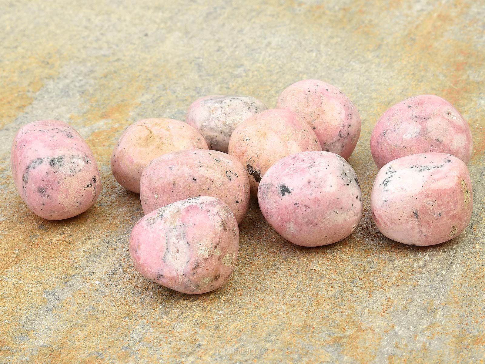 The Power of Rhodochrosite: Unveiling Its Meaning, Uses & Benefits