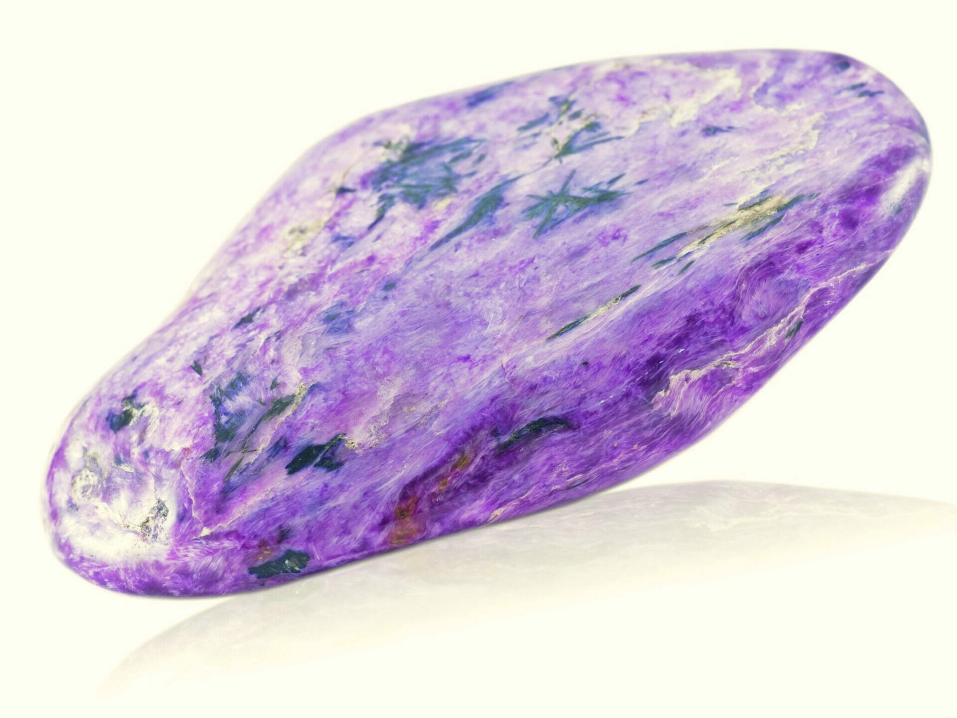 Unleashing the Power of Charoite: Meaning, Uses & Benefits